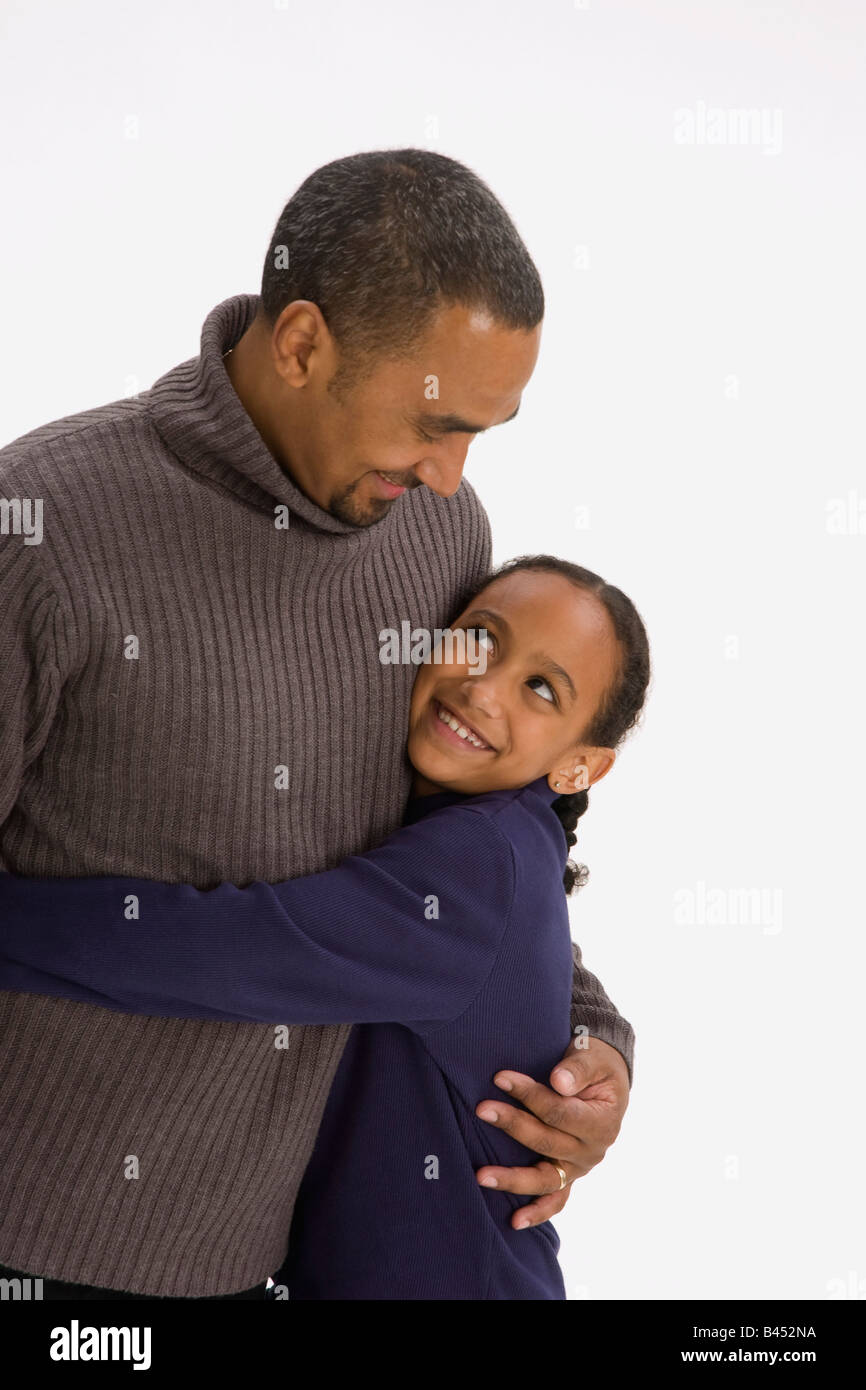 Father and daughter hugging Stock Photo - Alamy