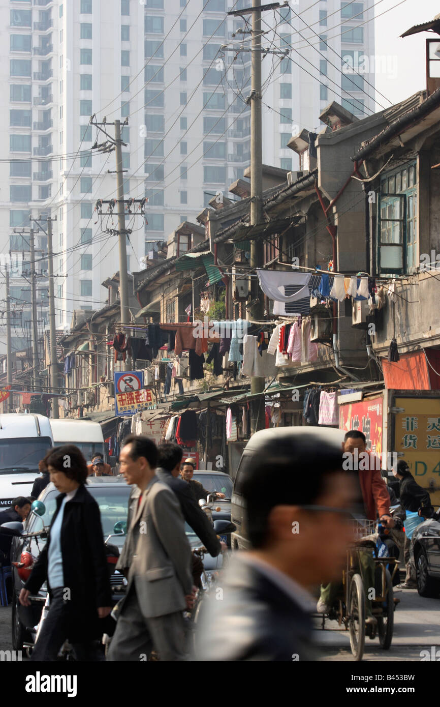 Row of old houses in the old town with highrise buildings in the ...