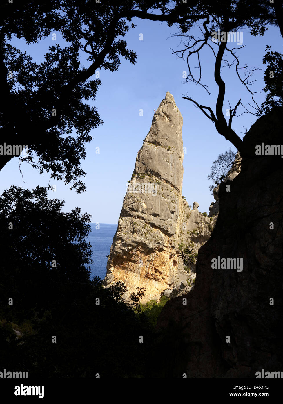 A mighty limestone rock at the east coast of Sardinia at the Golfo di ...