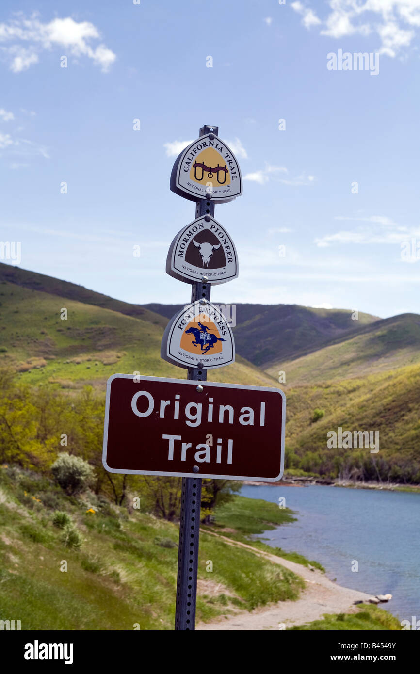 Signs for the old Mormon Pioneer Trail and the Pony Express by a lake ...