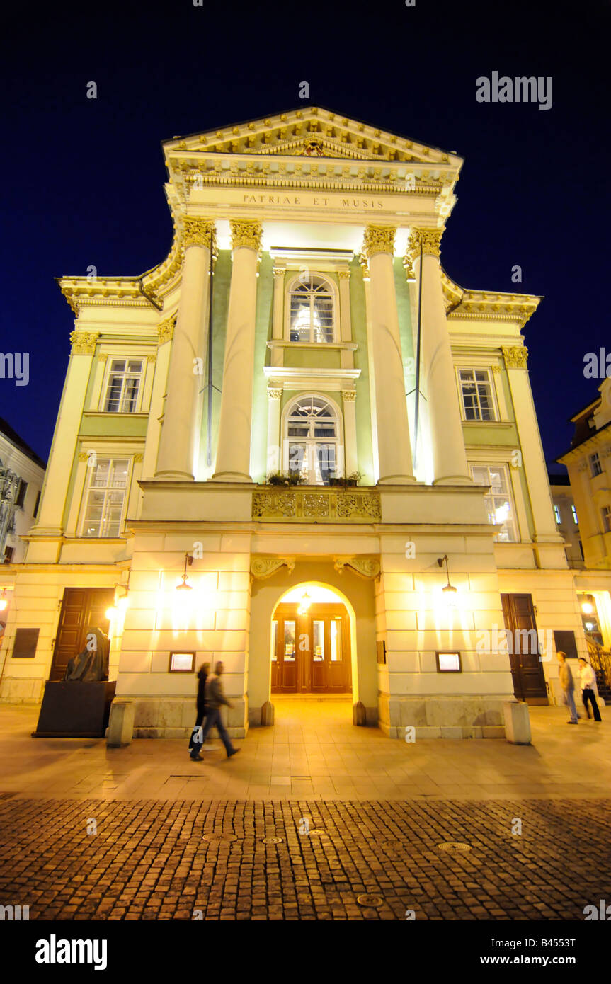 Night view of the illuminated exterior facade of the Estates Theater in ...