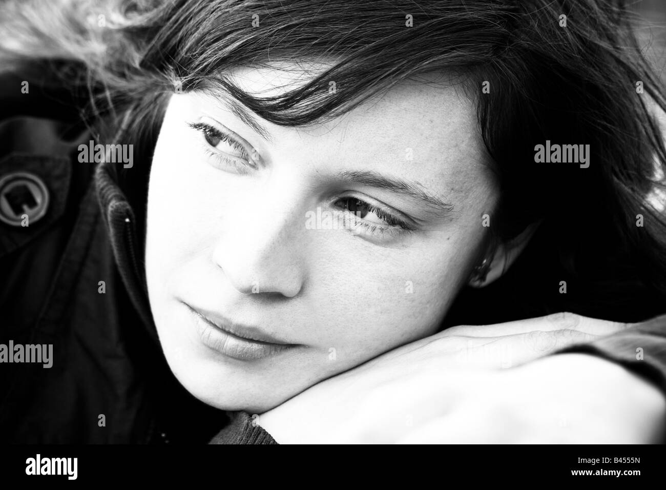 Caucasian woman in pensive expression Stock Photo - Alamy