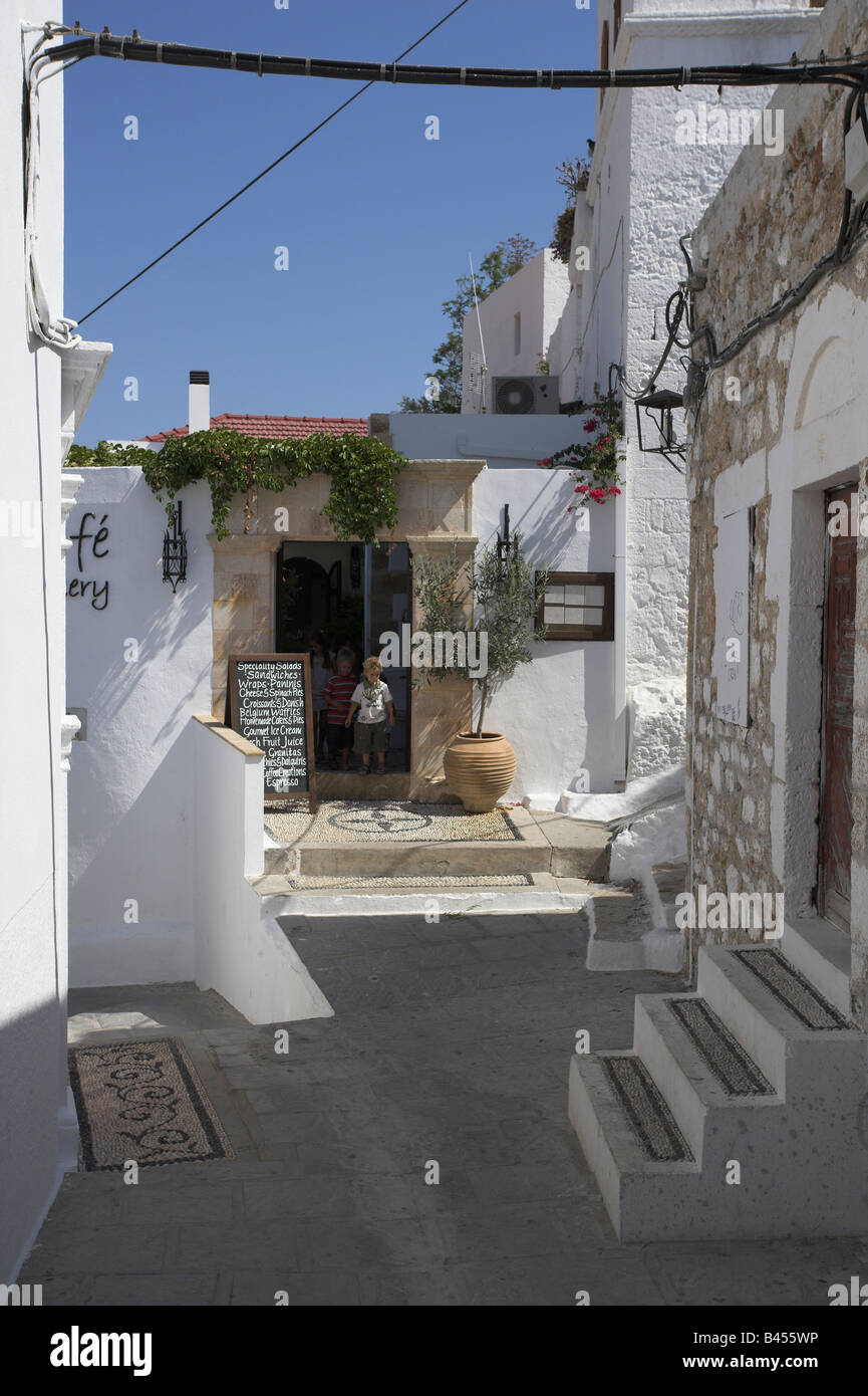 Above the modern town rises the acropolis of lindos hi-res stock ...
