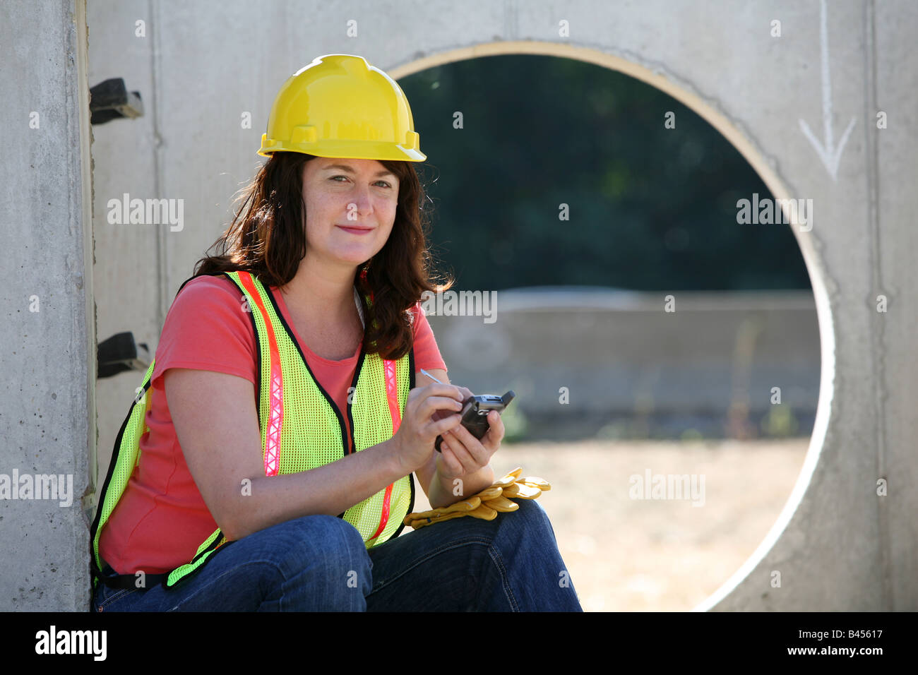 Woman working at a highway construction site in New York, USA Stock ...