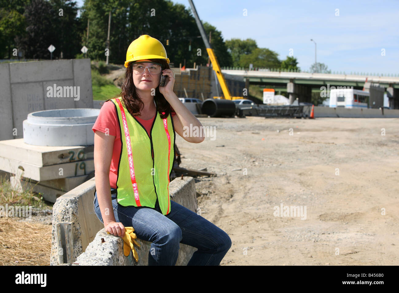 Woman working at a highway construction site in New York, USA Stock ...