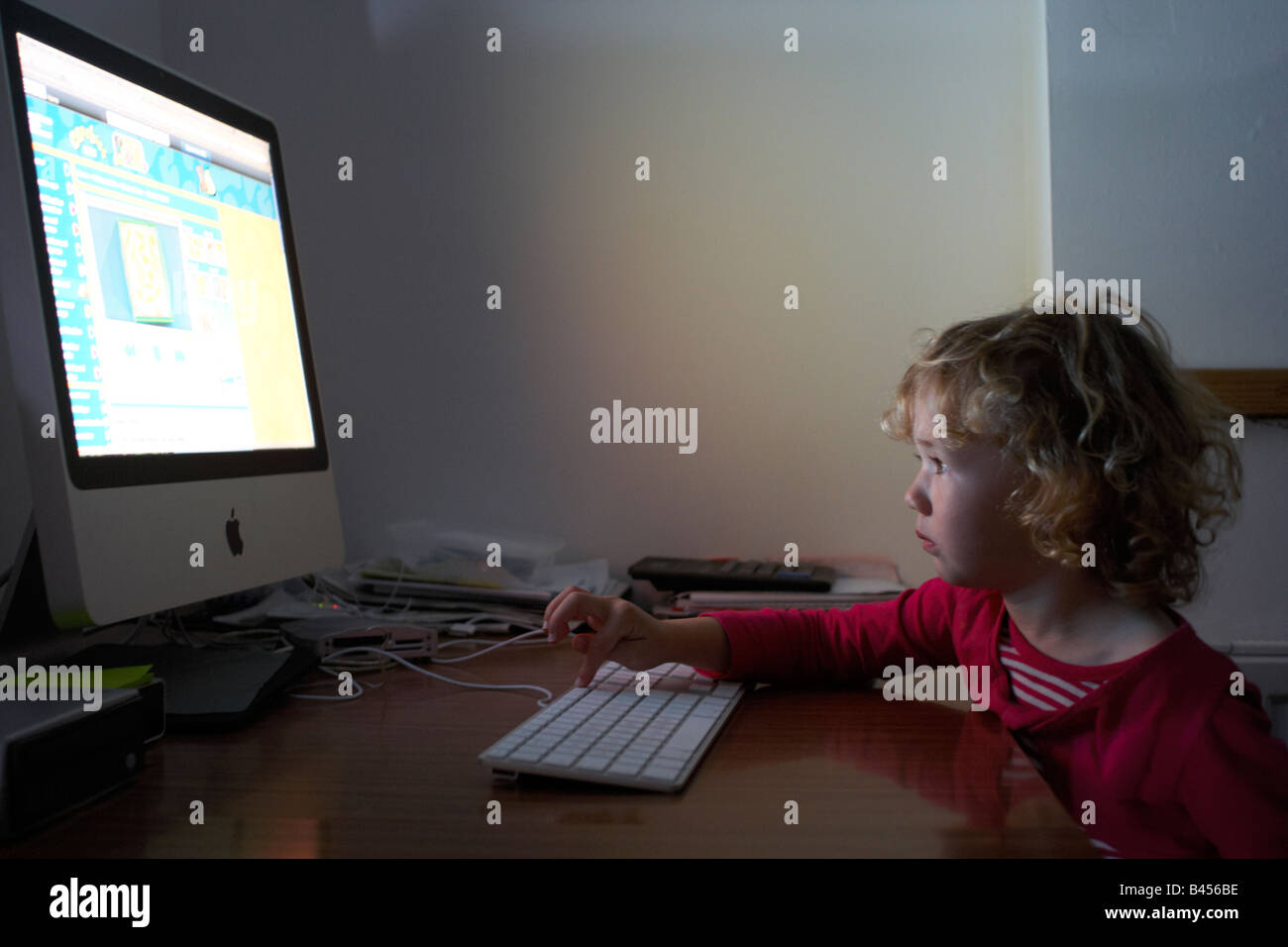 little girl surfing internet,concentrating,browsing internet with hand ...
