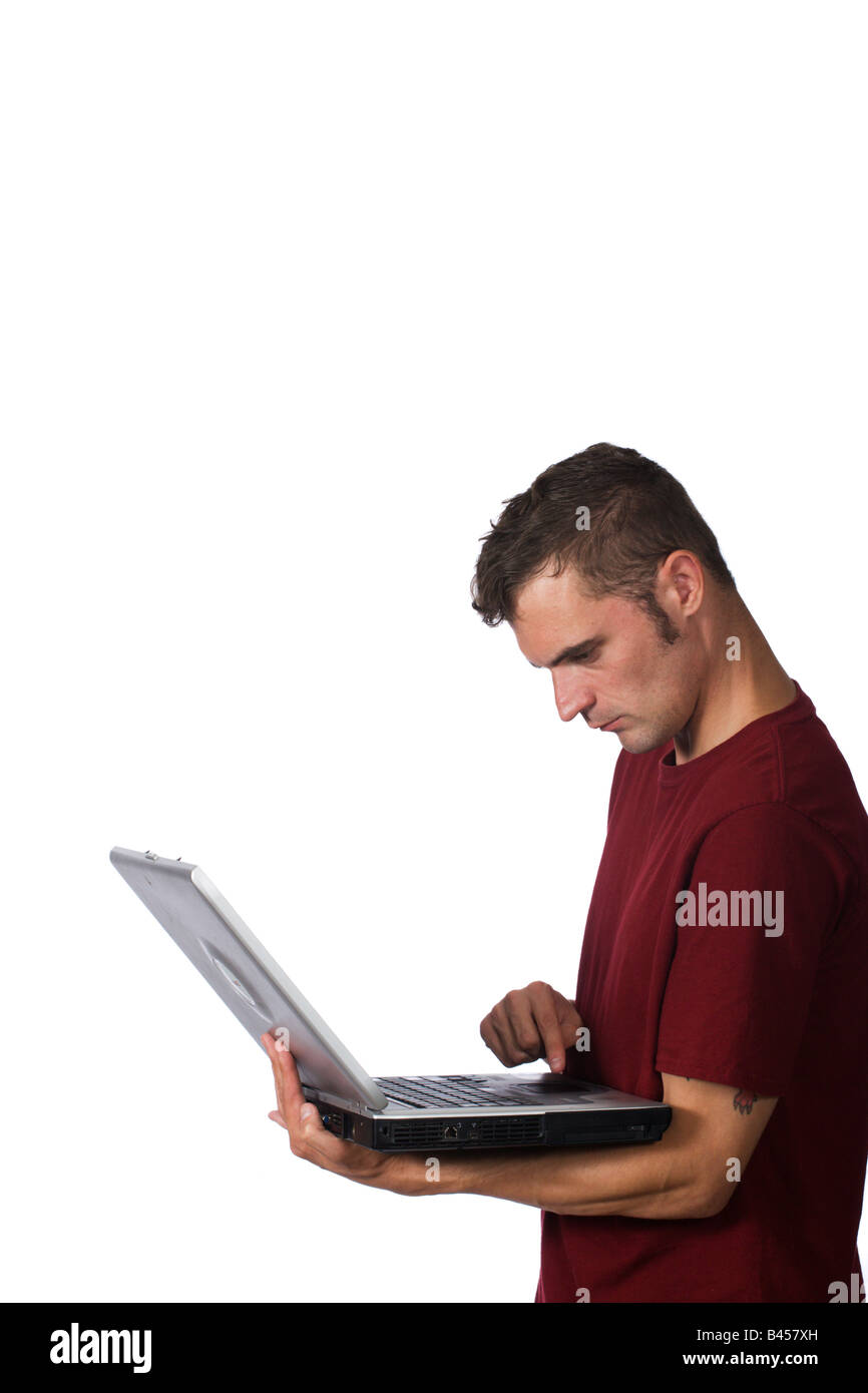 a man uses his laptop computer isolated on white background Stock Photo ...