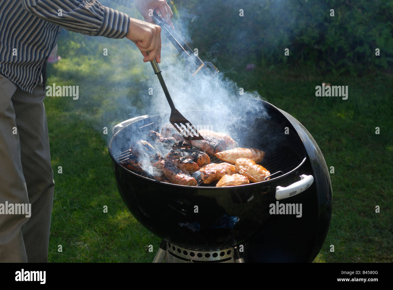 barbecue on a summer night, Sweden Stock Photo - Alamy