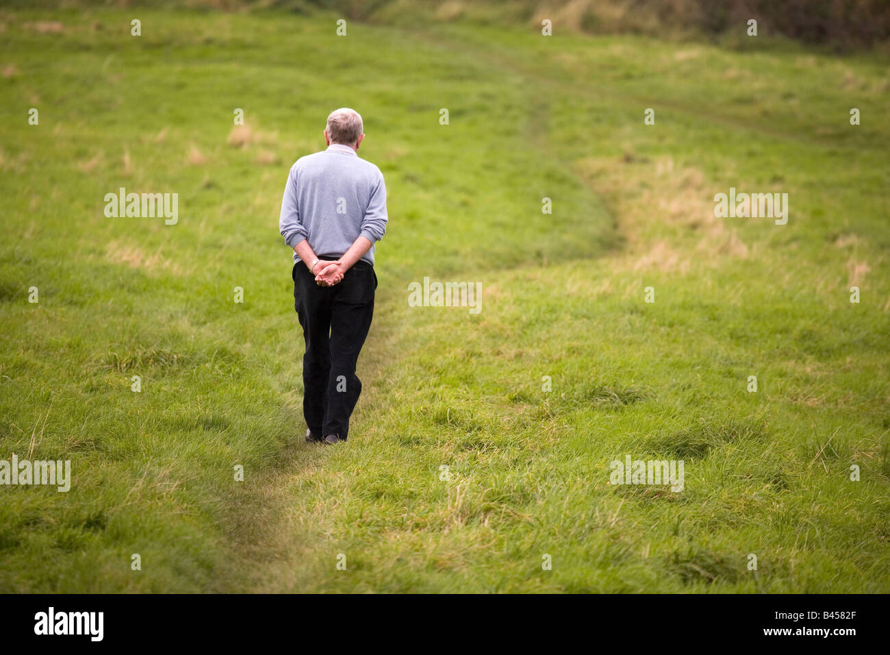 Man walks alone hi-res stock photography and images - Alamy