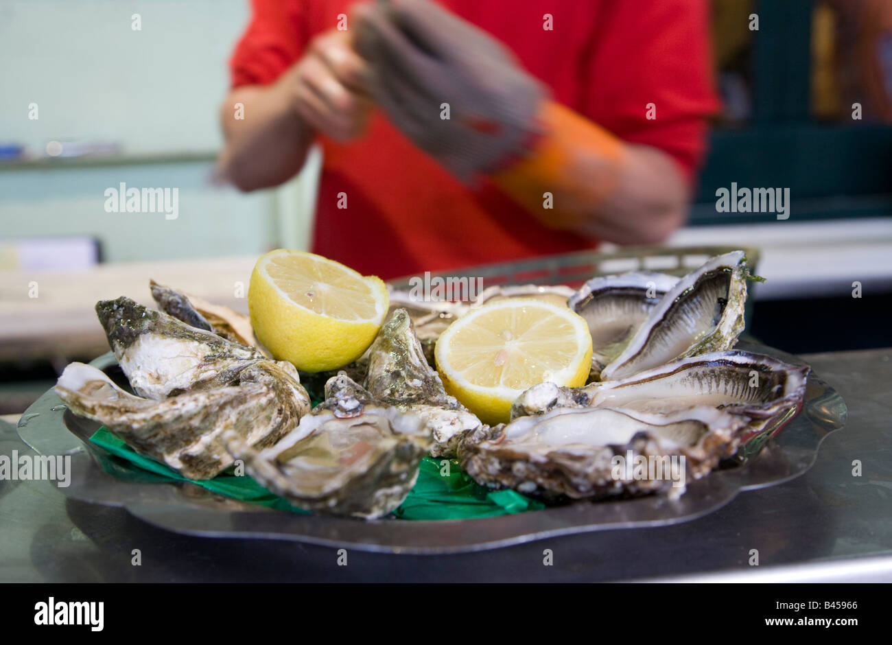 France, Cote d'Azur, Nice, Preparing oysters Stock Photo - Alamy