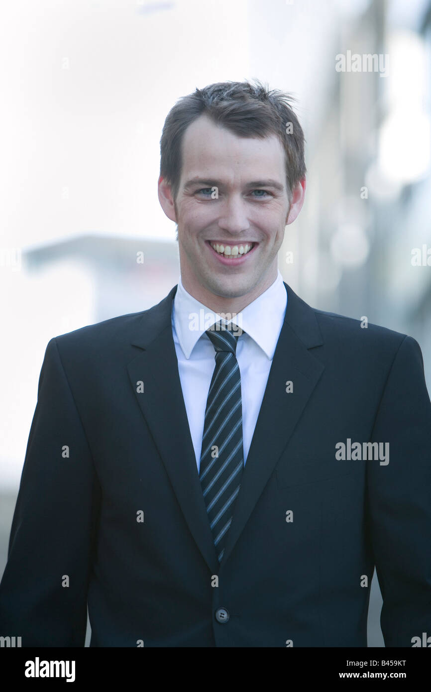 Germany, Baden-Württemberg, Stuttgart, businessman smiling, portrait ...