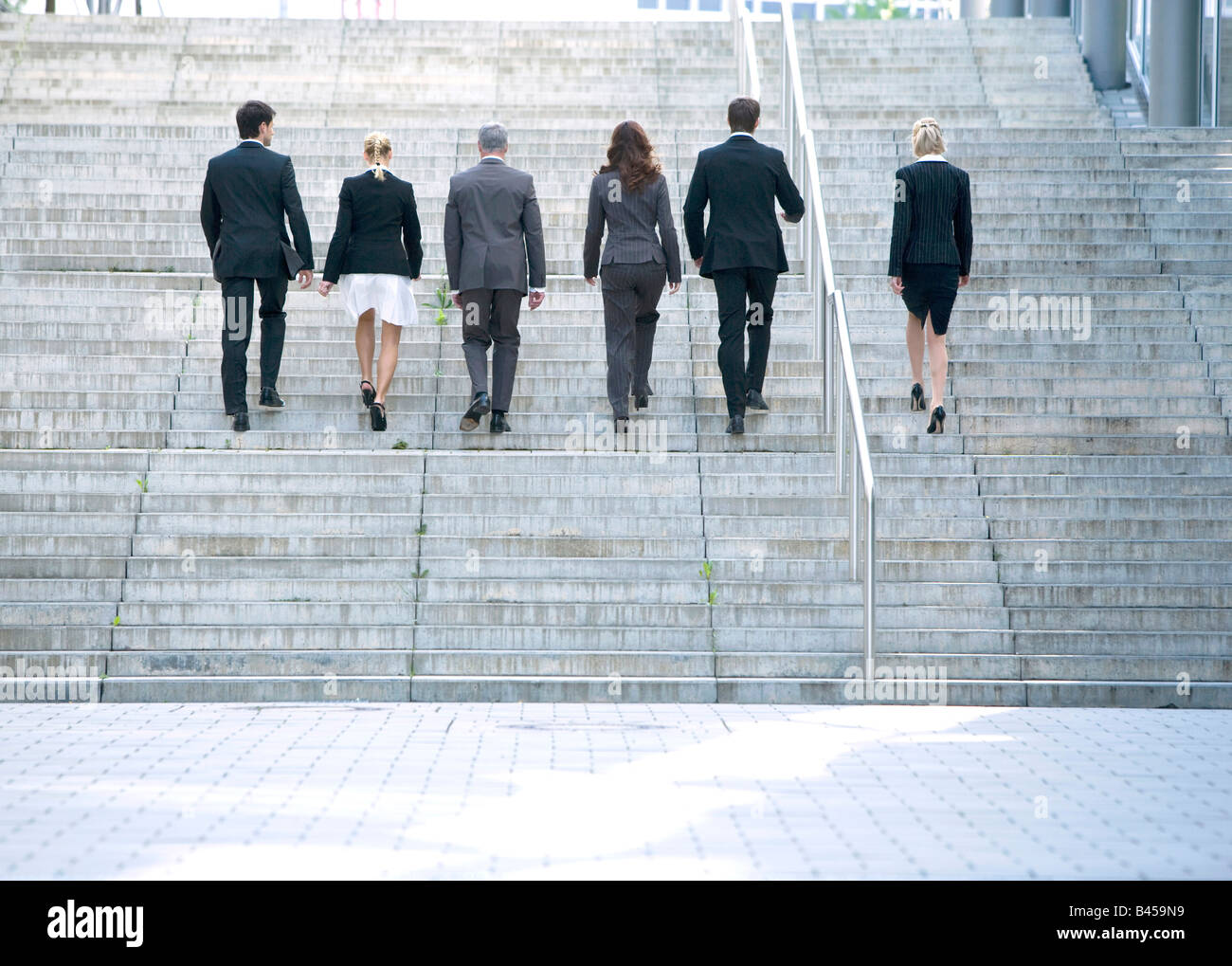 Man And Woman Going Up Steps High Resolution Stock Photography and ...