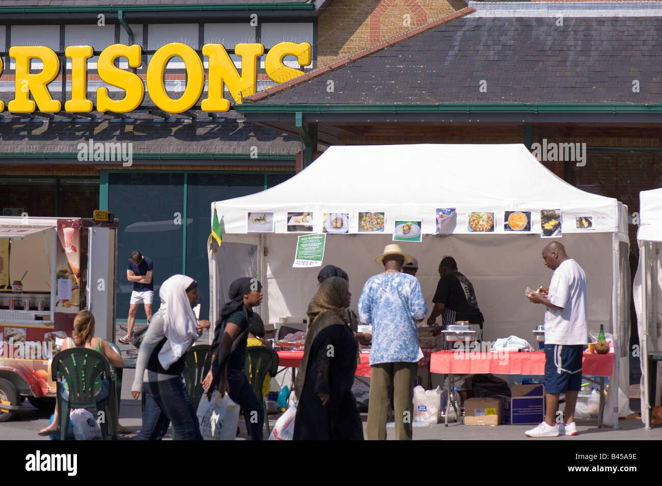 People shopping Acton Market W3 London United Kingdom Stock Photo - Alamy