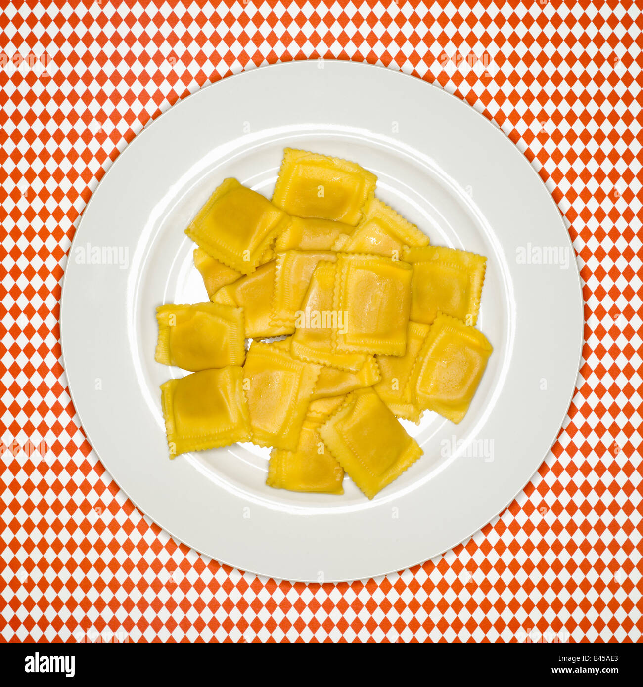 Uncooked Ravioli on plate, elevated view Stock Photo - Alamy