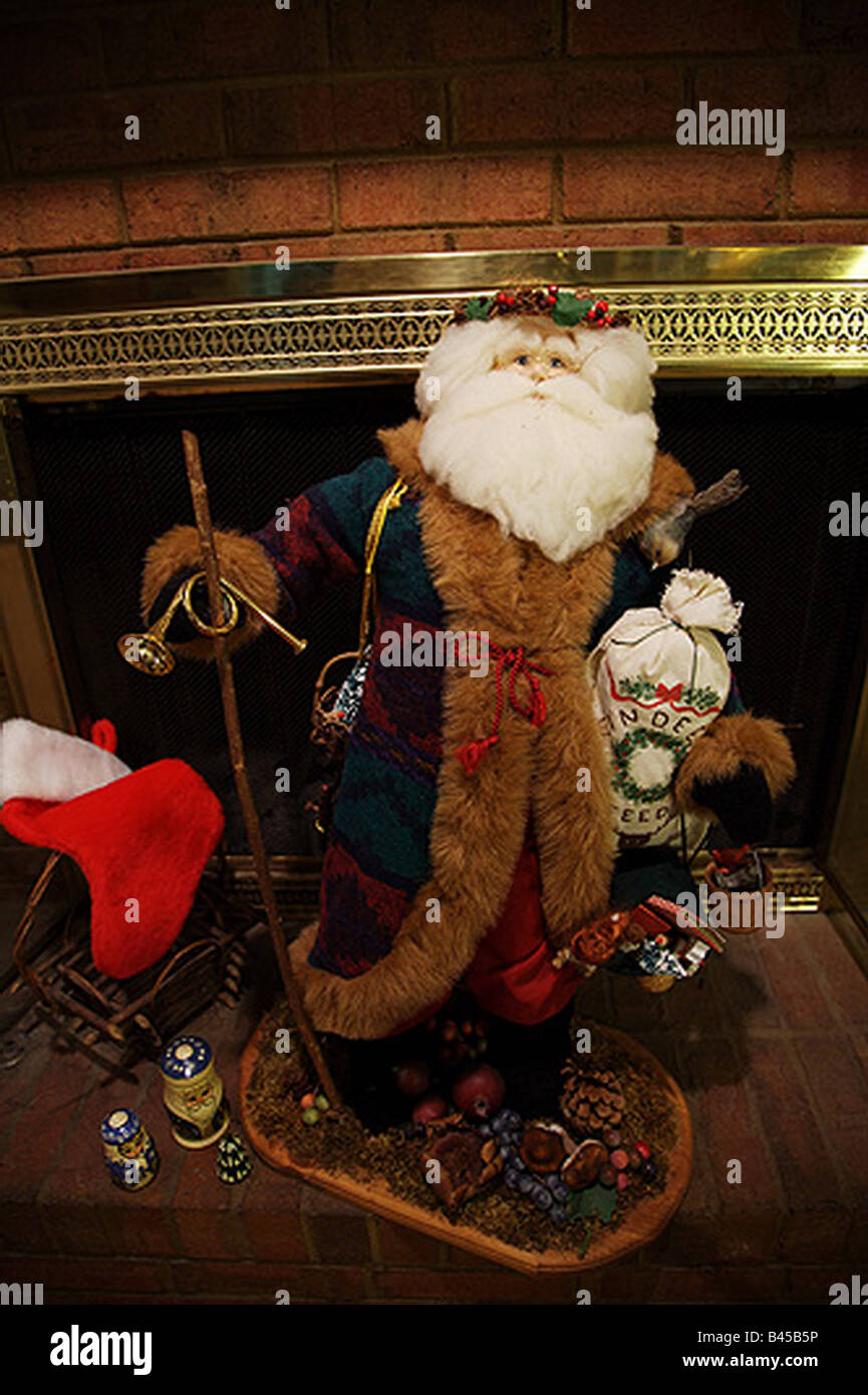 Santa claus in front fireplace hi-res stock photography and images - Alamy