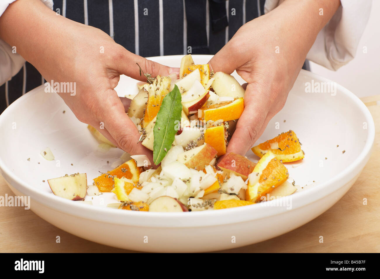 Person mixing the stuffing, close-up Stock Photo - Alamy