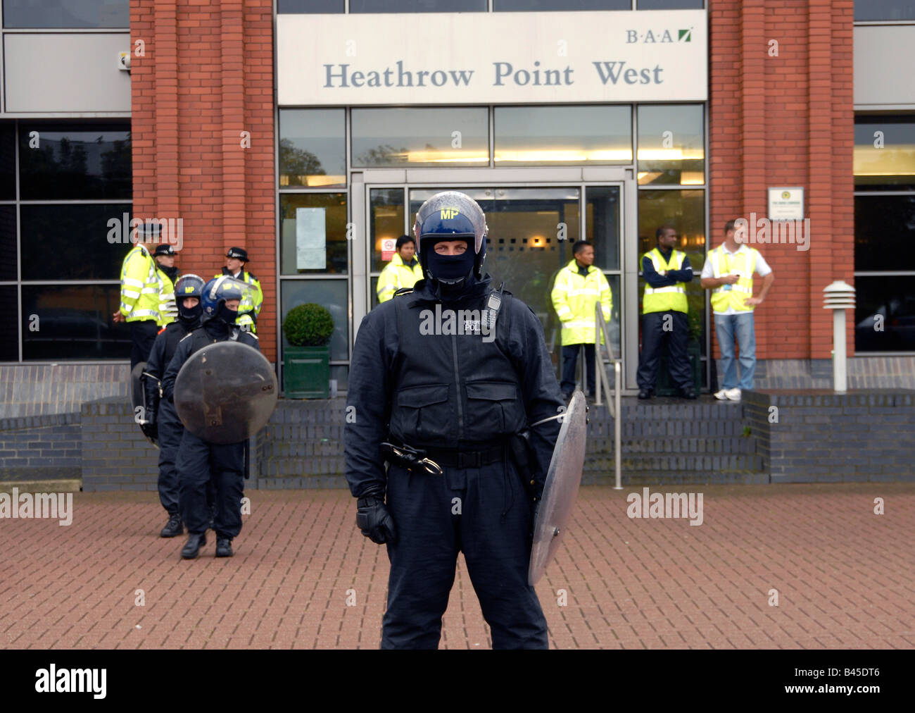Riot police protect BAA headquarters against Climate for Change ...