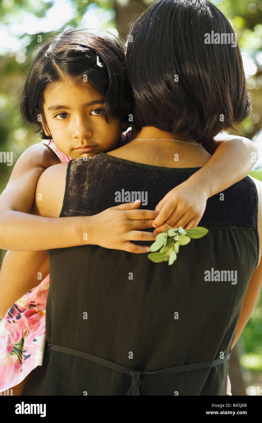 Indian daughter hugging mother hi-res stock photography and images - Alamy