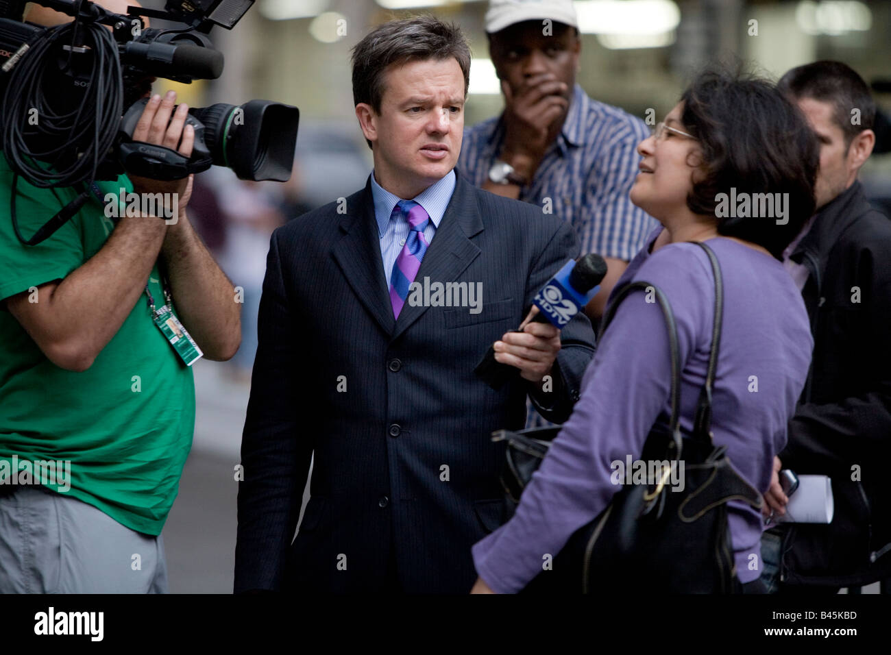 Dave Carlin reporter of channel WCBS 2 interviewing one of the ...