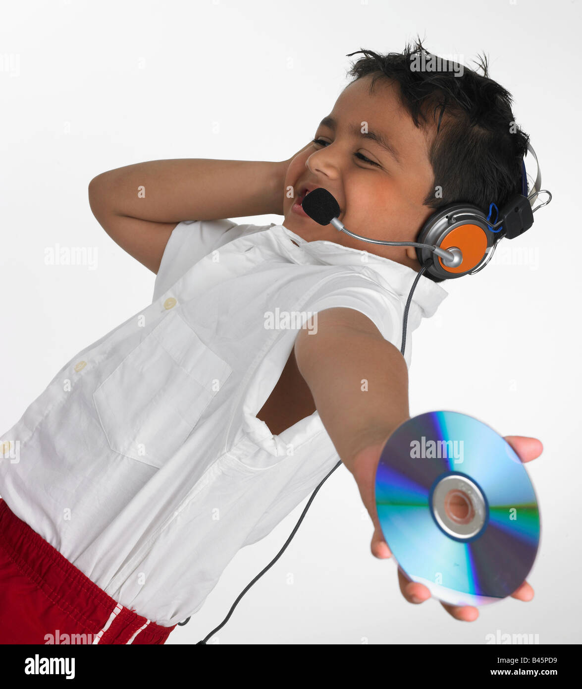 asain boy with a compact disc in his hand Stock Photo - Alamy