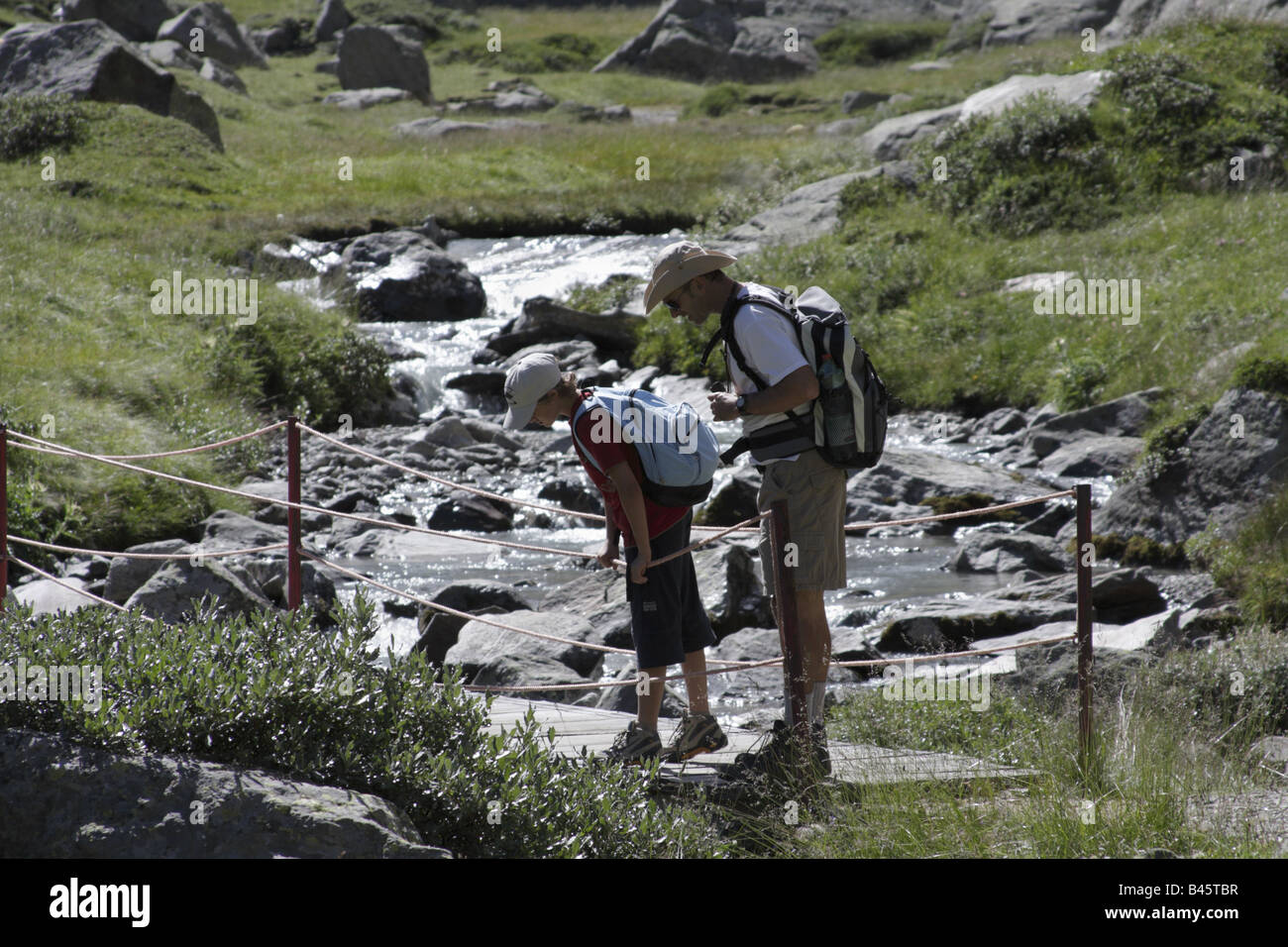 Footbridge river alps italy hi-res stock photography and images - Alamy