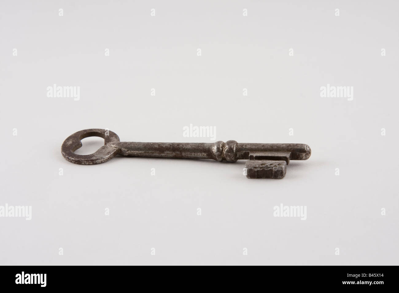 Antique key with heart shaped head Stock Photo - Alamy