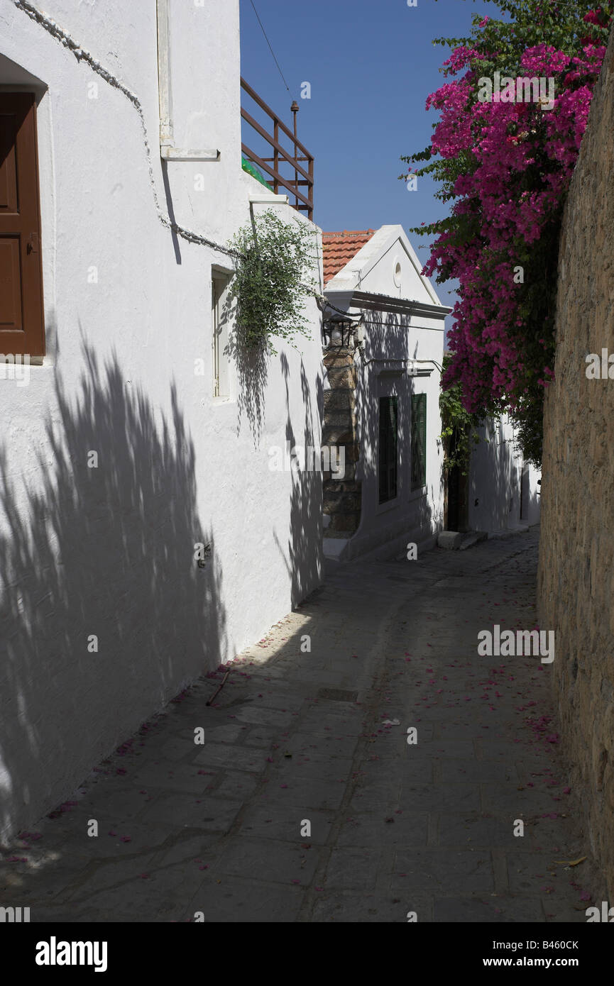 Above the modern town rises the acropolis of lindos hi-res stock ...
