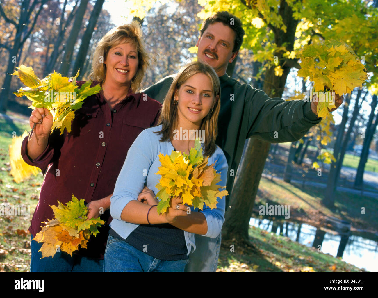 Family at autumn Stock Photo - Alamy