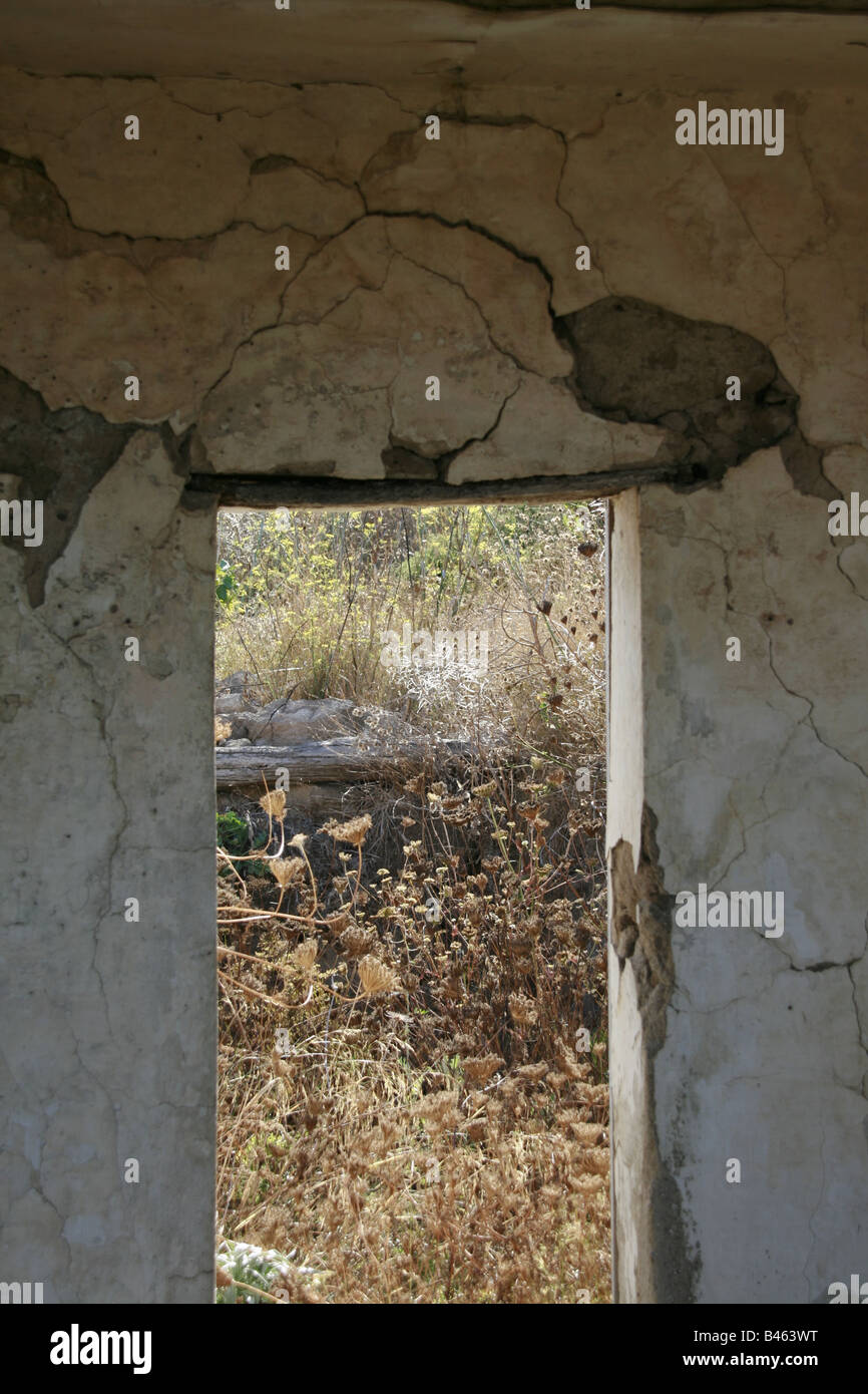 one damaged missing open door way in derelict property Stock Photo - Alamy