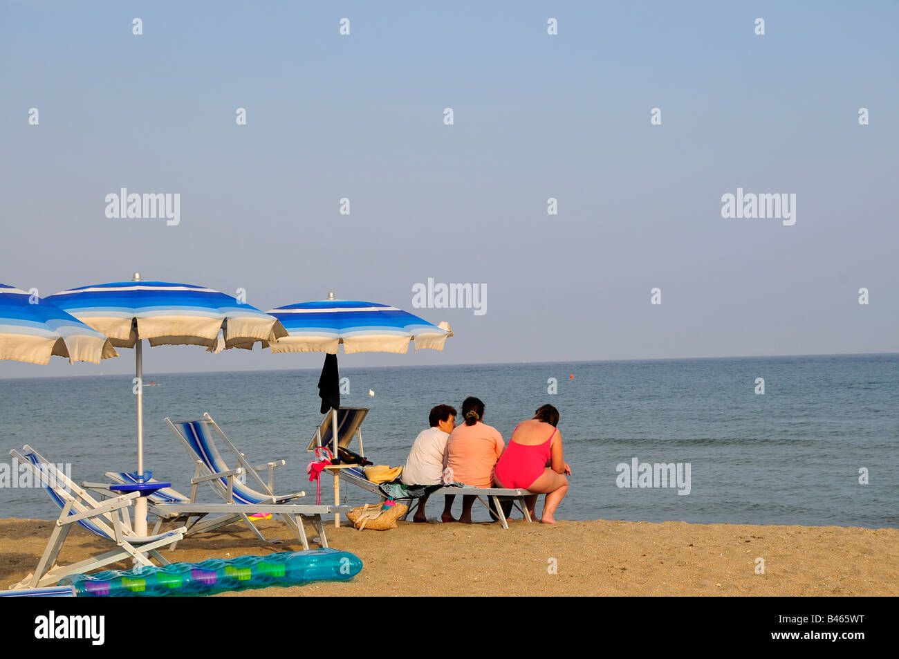 ladies on the beach Stock Photo - Alamy