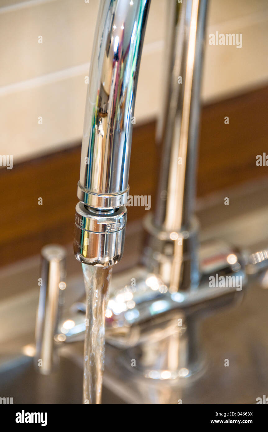 Running water from a tap, UK Stock Photo - Alamy