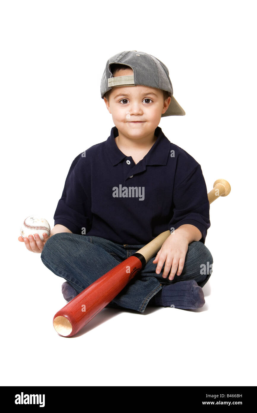 Latino boy with baseball bat and ball Stock Photo - Alamy
