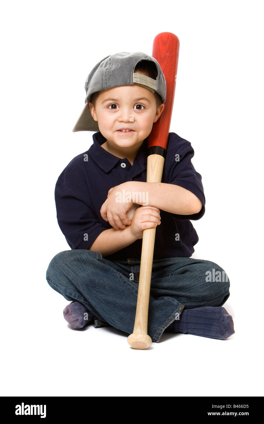 Young hispanic boy with a baseball bat and ball Stock Photo - Alamy