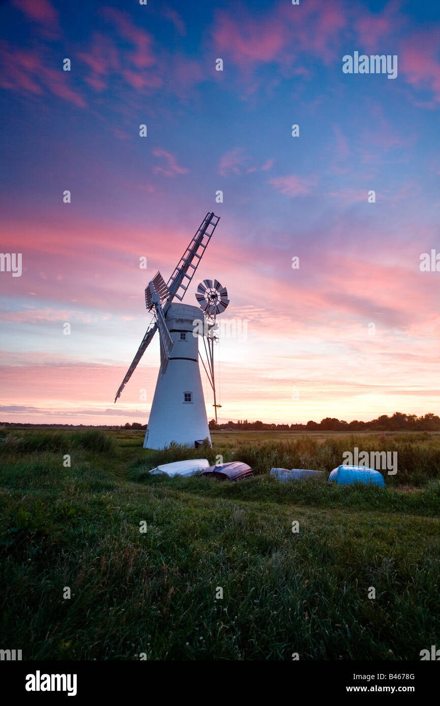 A spectacular summer sunrise behind Thurne Windmill on the Norfolk ...