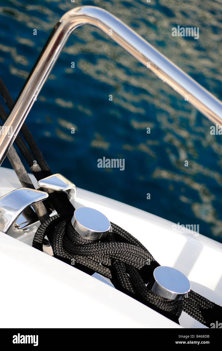 Detail of ropes and chrome hand rail on board a super yacht. Picture by ...