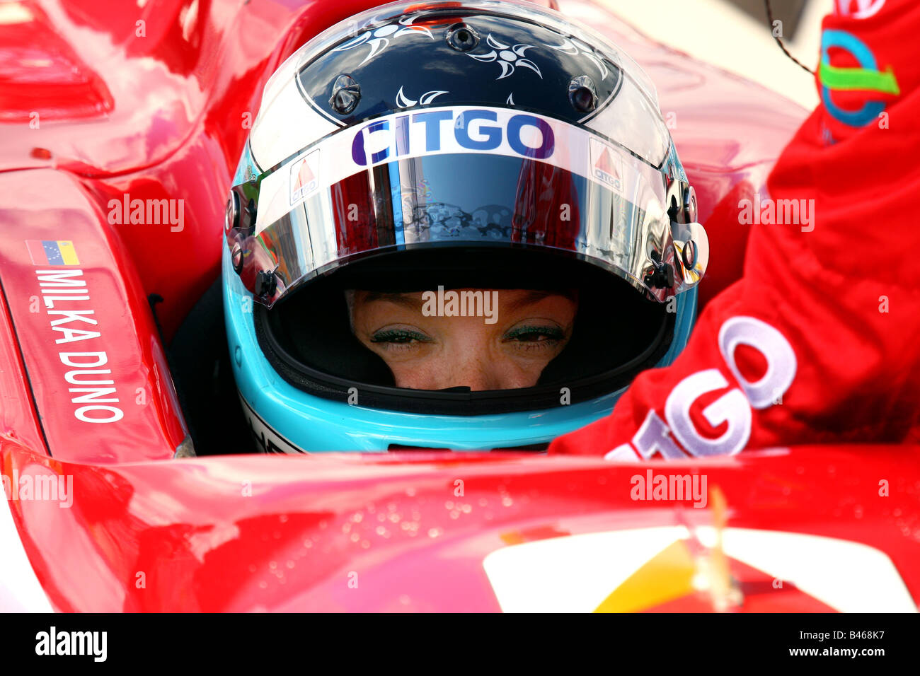 Milka Duno facing straight on, race ready, IRL Indycar close-up helmet ...