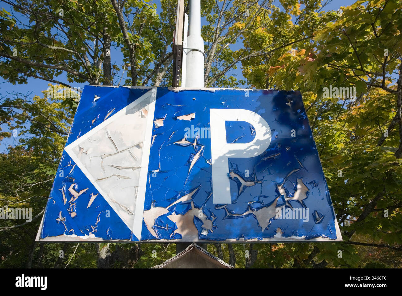 weathered parking lot sign Stock Photo - Alamy