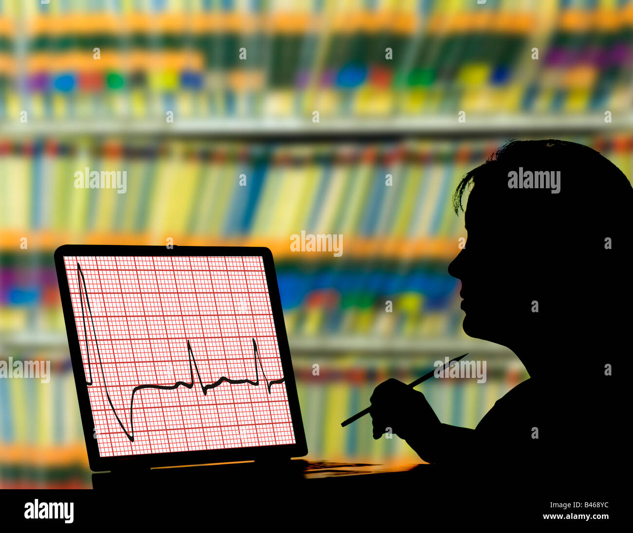 nurse checking EKG on laptop computer in medical library Stock Photo ...