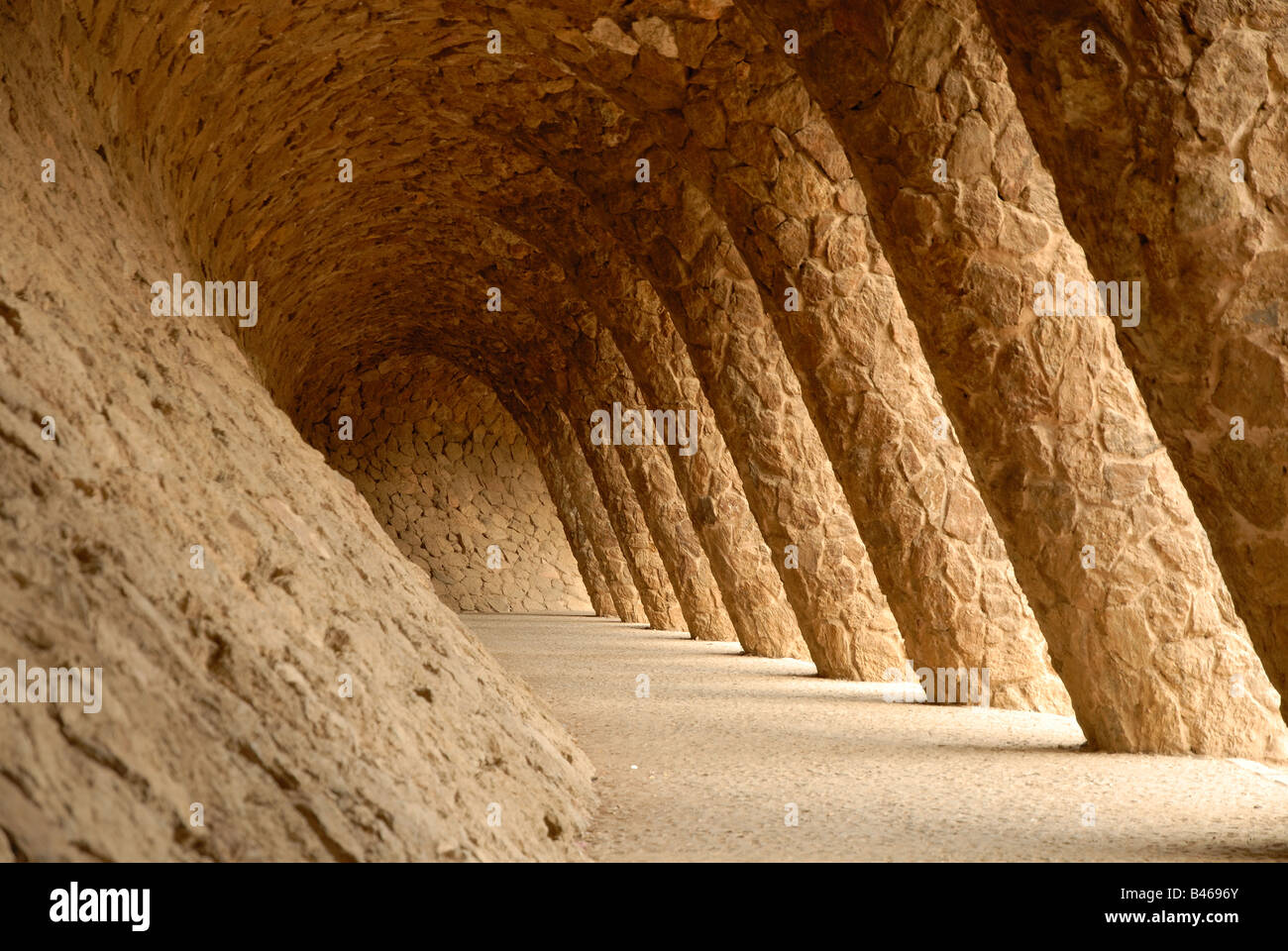 Columns designed by Antoni Gaudi. Park Guell in Barcelona Spain Stock ...