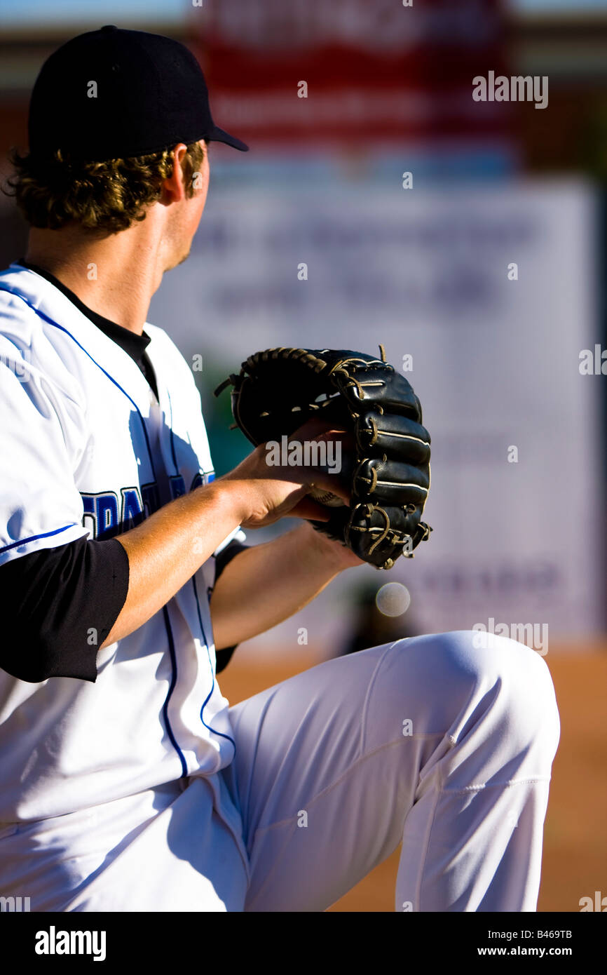 Rear view of a baseball player about to throw Stock Photo - Alamy