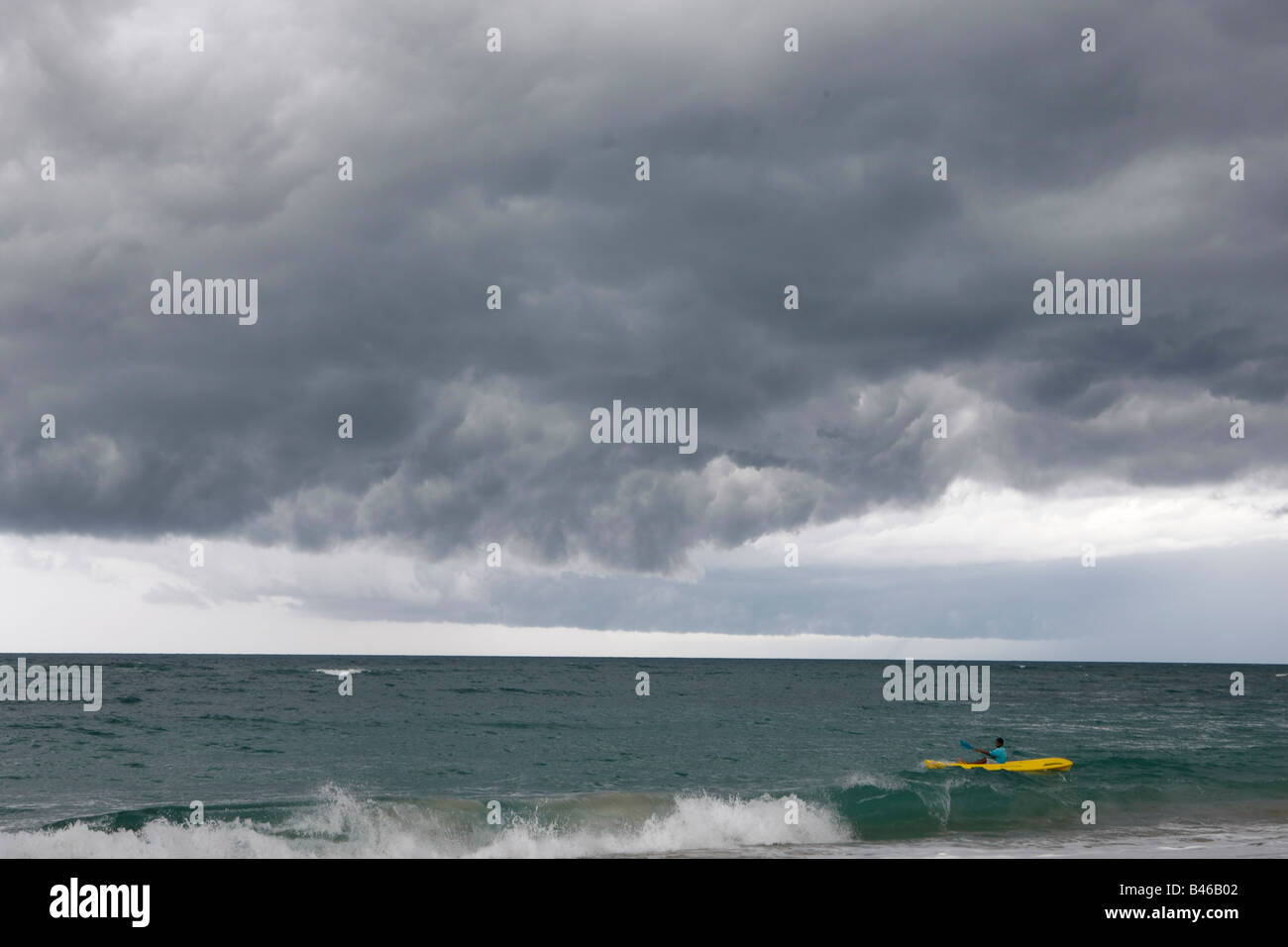 kayak in a storm Stock Photo - Alamy