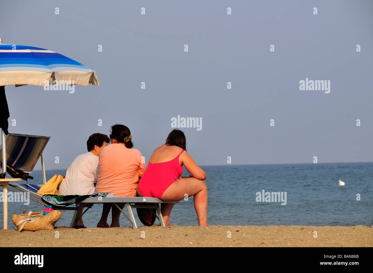 ladies on the beach Stock Photo - Alamy