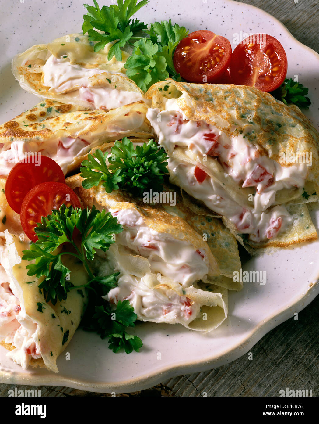 Crepes stuffed with goats cheese editorial food Stock Photo - Alamy