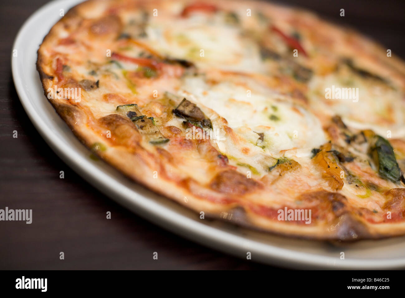 Goats cheese and roasted vegetable pizza Stock Photo - Alamy