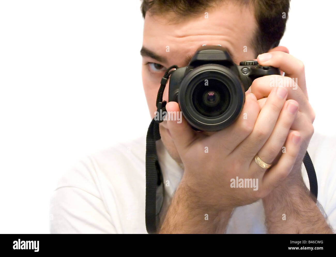 A young photographer taking a shot with his DSLR camera Stock Photo - Alamy