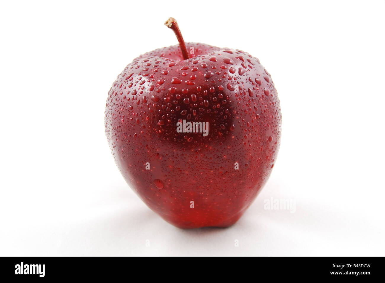 A delicious fresh red apple isolated on a white background Stock Photo ...