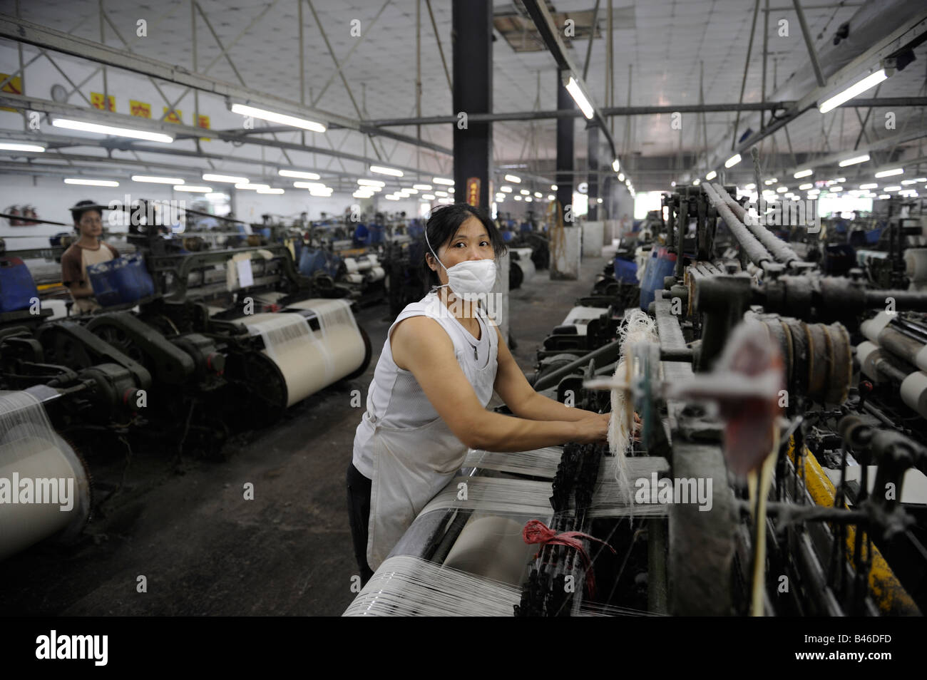 Woman working in a textile factory hi-res stock photography and images ...