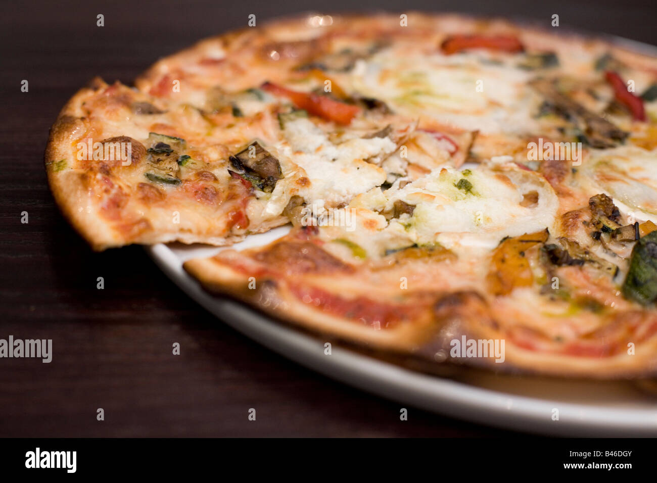 Goats cheese and roasted vegetable pizza Stock Photo - Alamy
