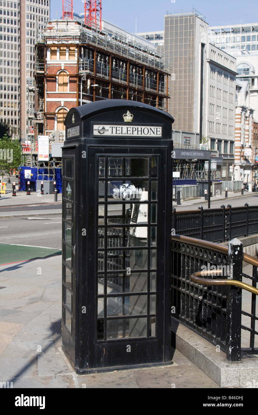 black painted telephone box city of london england Stock Photo - Alamy