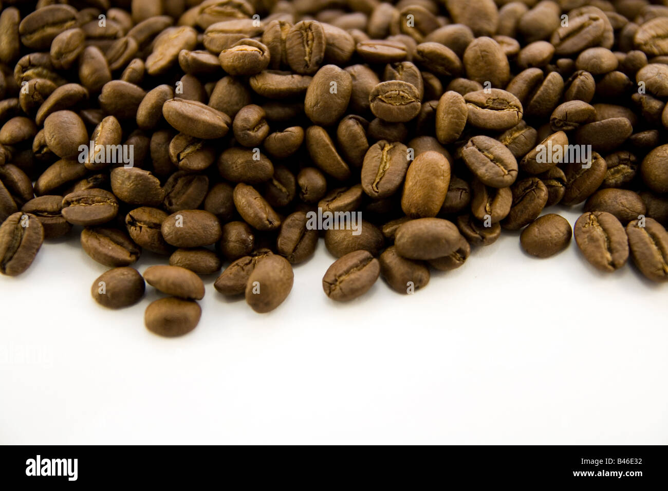 coffee beans isolated on white Stock Photo - Alamy